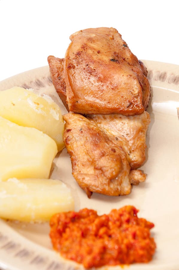 Chicken Meat Served with Ajvar and Potato Stock Photo - Image of ...