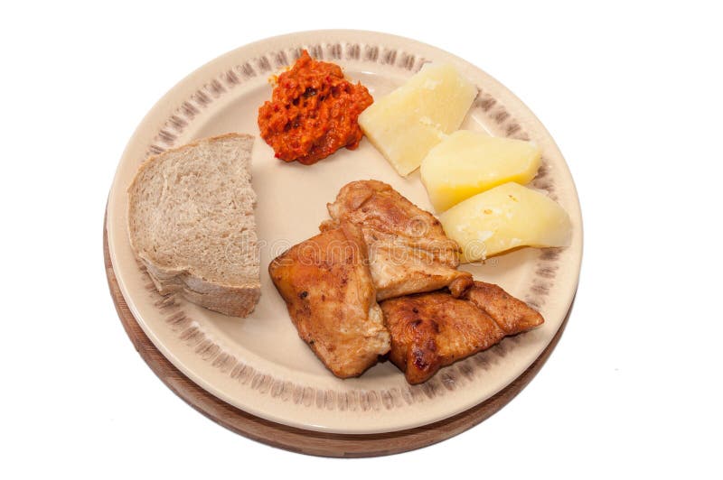 Chicken Meat Served with Ajvar and Potato Stock Photo - Image of ...