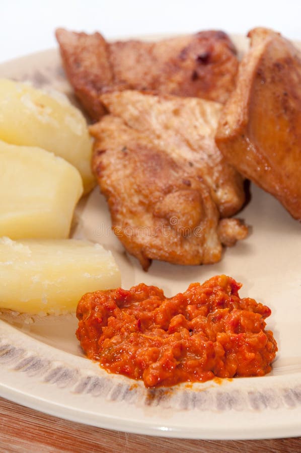 Chicken Meat Served with Ajvar and Potato Stock Photo - Image of meat ...