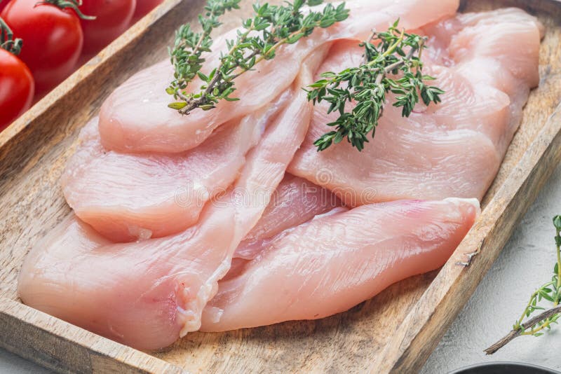 Chicken Meat Slices Uncooked, on White Background Stock Image - Image ...