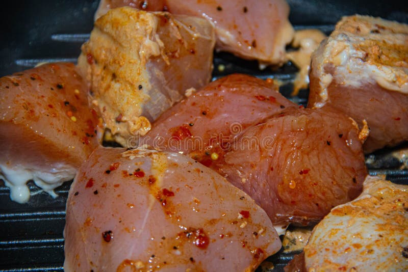 Chicken Meat Sprinkled with Spices is Fried in a Grill Pan Stock Photo ...