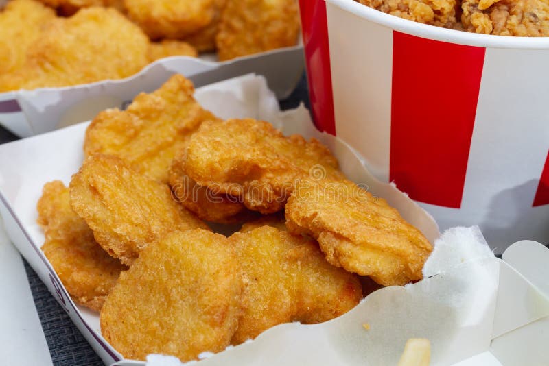 Chicken Nuggets in Batter of Different Types in Paper Packaging Stock ...