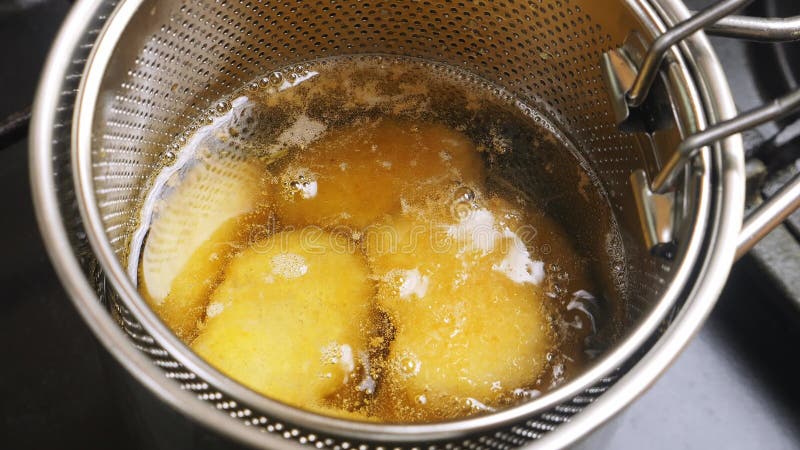 Chicken Nuggets in a Deep-fat Grid are Fried in Boiling Oil Stock Video ...