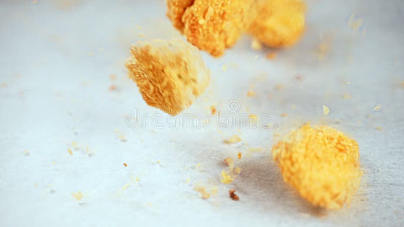Chicken nuggets falling stock footage. Video of nuggets - 207336458