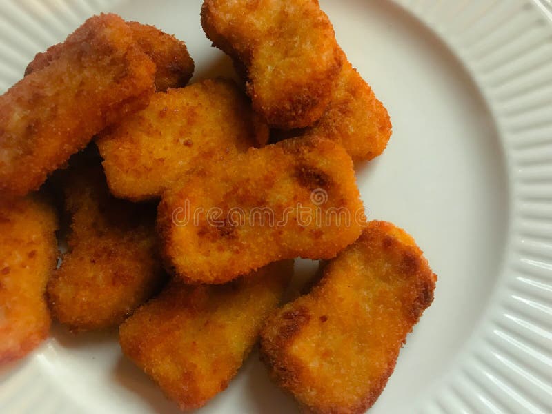 Chicken nuggets on a plate stock photo. Image of meat - 109791268