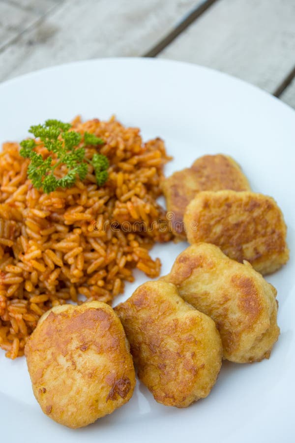 Chicken Nuggets and Rice with Tomato Stock Image - Image of plate, meal ...