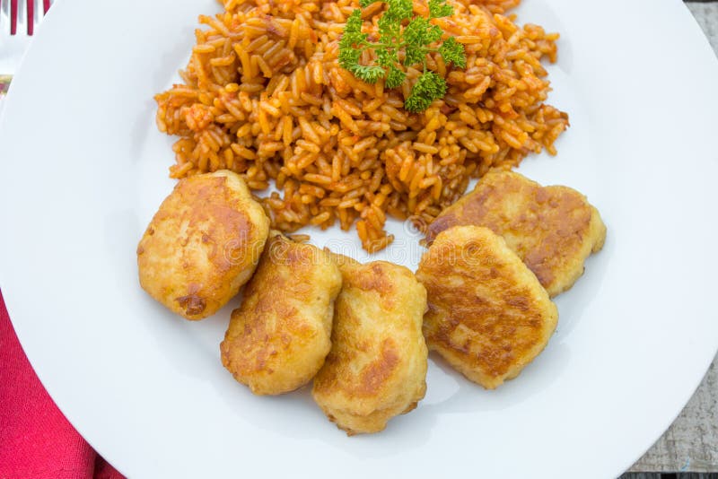 Chicken Nuggets and Rice with Tomato Stock Image - Image of dish ...