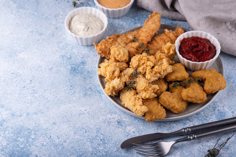 Chicken Nuggets, Strips and Bites Stock Photo - Image of baked, nuggets ...