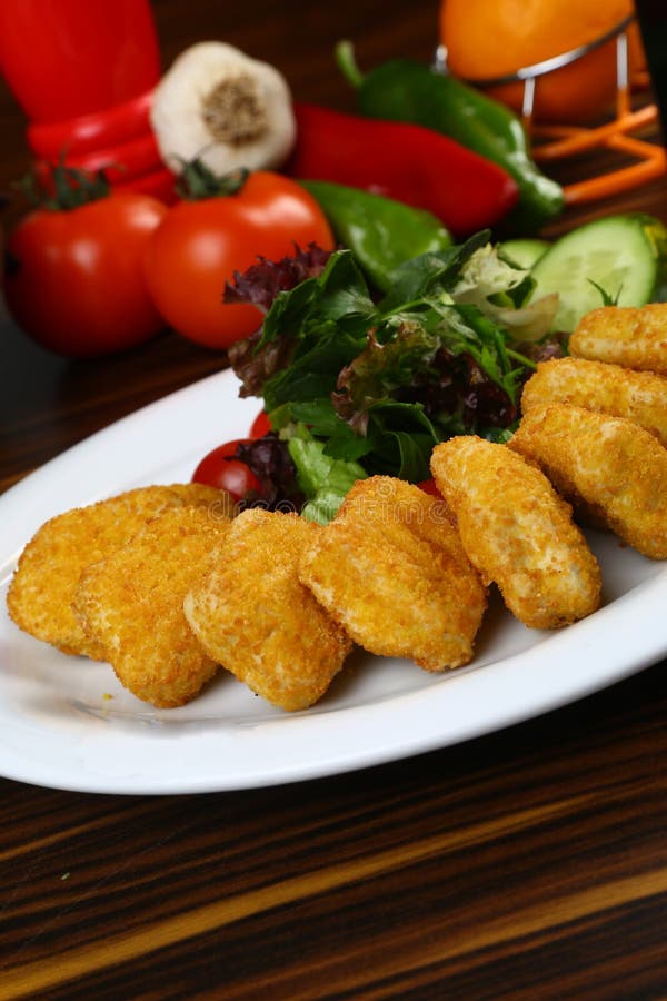 Chicken Nuggets with Vegetables Stock Image - Image of coated, junk ...