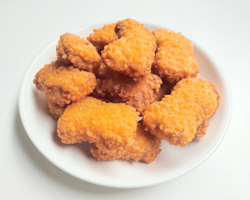 Chicken Nuggets in a White Plate on a White Background. Stock Image ...