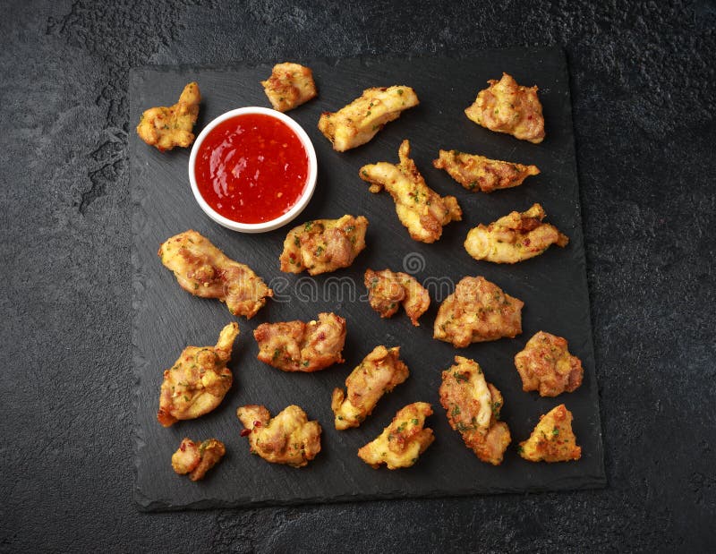 Chicken Pakora Dish with Sweet Chilli Sauce on White Wooden Board Stock ...