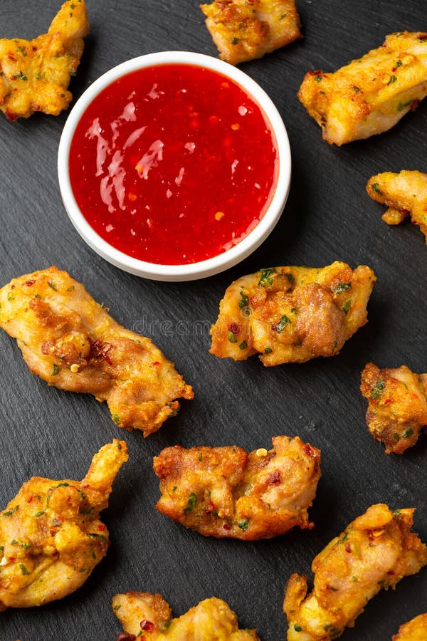 Chicken Pakora Dish with Sweet Chilli Sauce on White Wooden Board Stock ...
