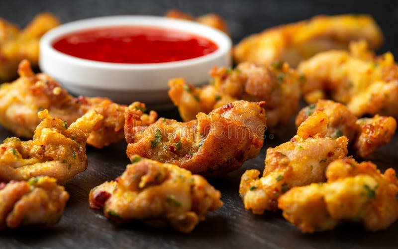 Chicken Pakora Dish with Sweet Chilli Sauce on White Wooden Board Stock ...