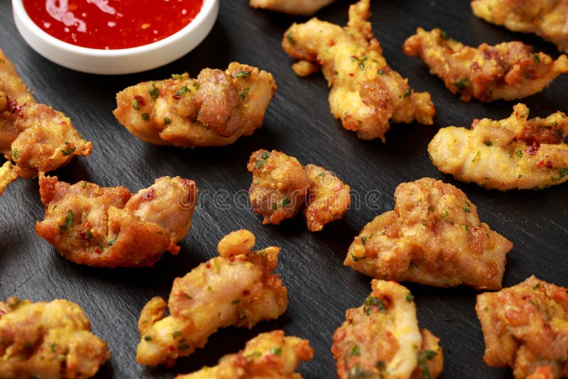 Chicken Pakora Dish with Sweet Chilli Sauce on White Wooden Board Stock ...