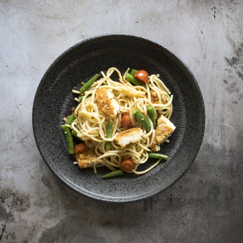 Chicken Pasta with Vegetables Stock Photo - Image of closeup, concrete ...