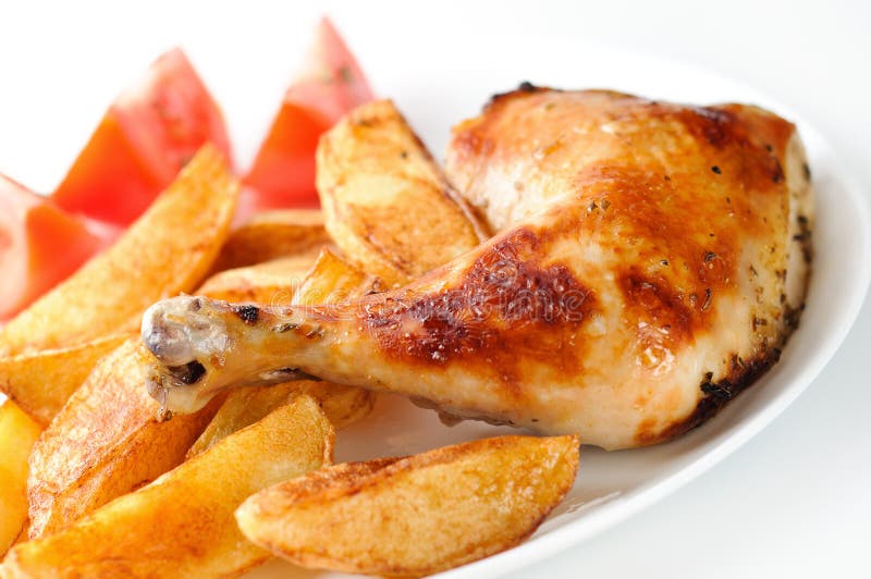 Chicken with potatoes stock image. Image of golden, delicious - 17805723
