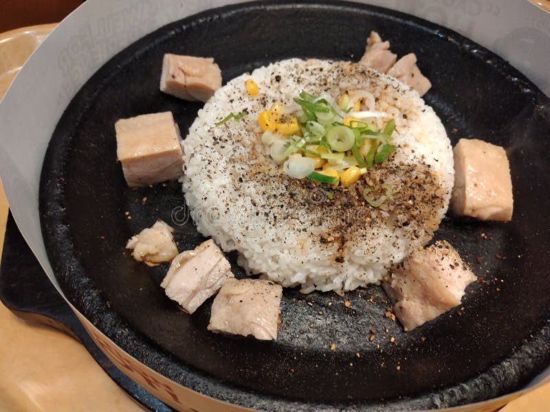 Chicken Rice in a Hot Plate Stock Photo - Image of restaurant, food ...