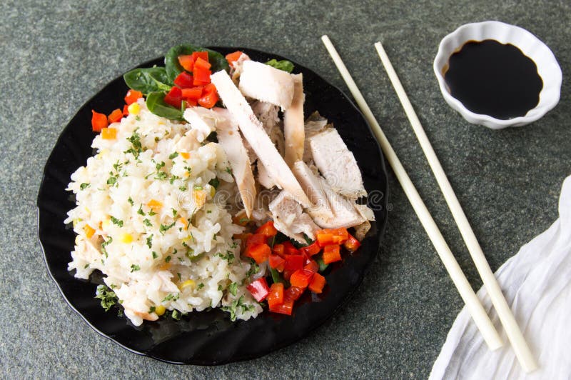 Chicken with Rice and Vegetables on a Plate Stock Photo - Image of ...