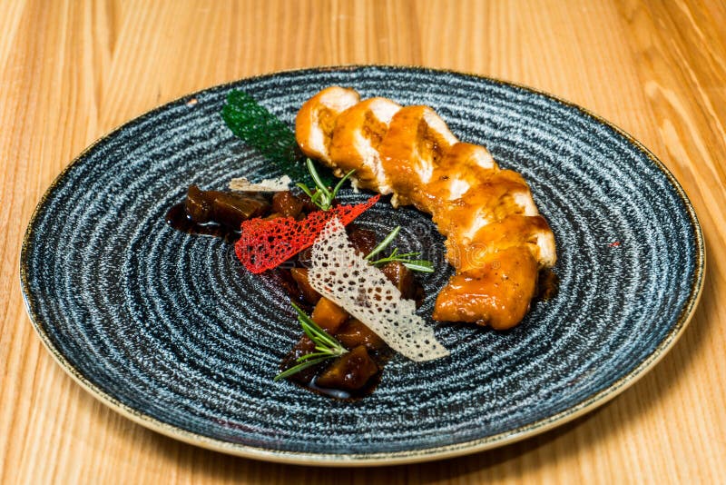 Chicken Roll in a Black Plate Stock Photo - Image of appetizer, plate ...