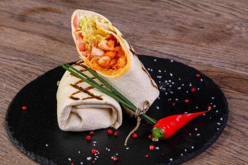 Chicken roll with tortilla stock photo. Image of isolated - 115733200