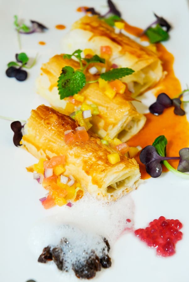 Chicken Rolls Wrapped in Pastry with Fruit Salad Stock Photo - Image of ...