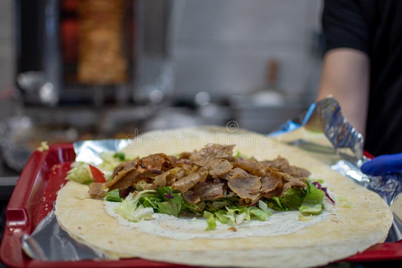 Making a Kebab in a Restaurant Chicken Salad in Rollo Stock Image ...