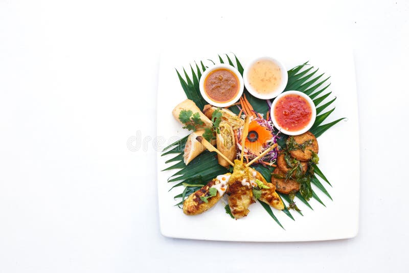 Chicken Satay and Fried Fish-paste Balls and Spring Rolls Stock Image ...