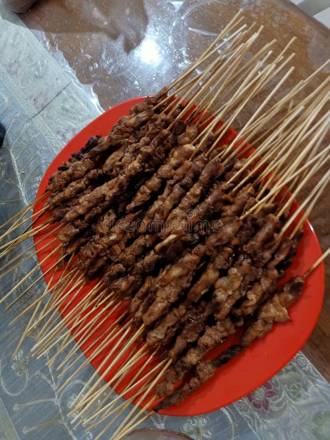 Chicken Satay on a Red Plate with Peanut Sauce Stock Image - Image of ...
