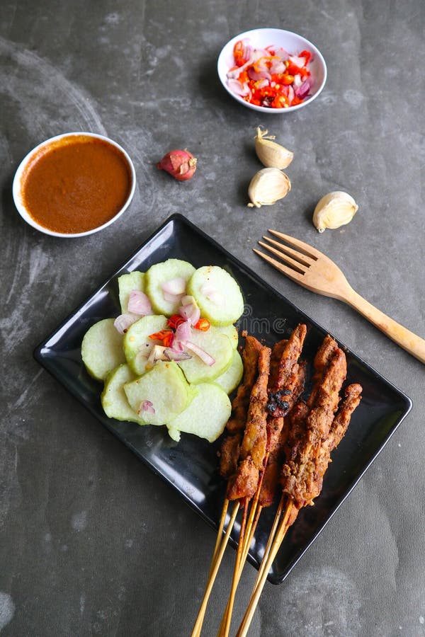 Chicken Satay or Chicken Satay Served with Lontong, Rice Cake and ...