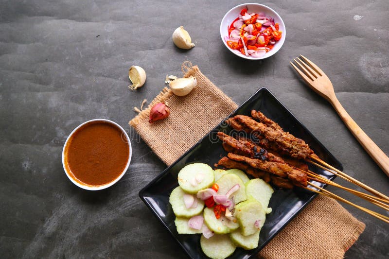 Chicken Satay or Chicken Satay Served with Lontong, Rice Cake and ...
