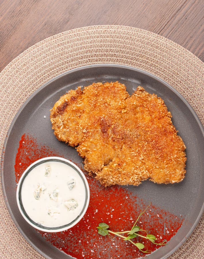 Chicken Schnitzel with Blue Cheese Sauce and Paprika Stock Image ...