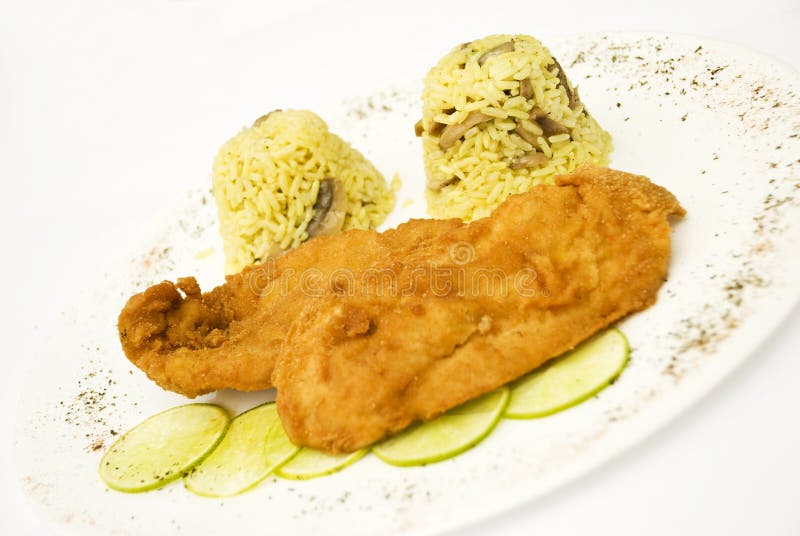 Chicken Schnitzel with Rice Garnish Stock Photo - Image of background ...