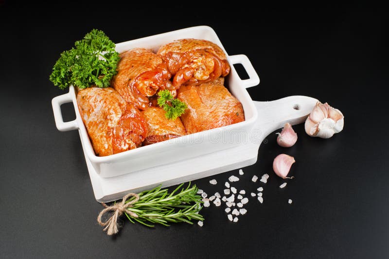 Raw Chicken Thighs Marinated in Red Sauce. Chicken Semi-cooked Thighs ...