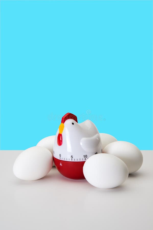 Chicken Shaped Kitchen Timer with Eggs on a White Table and Vibrant ...