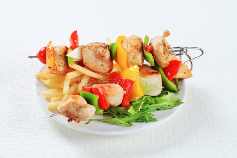 Chicken Shish Kebabs with Fries Stock Image - Image of potato, metal ...