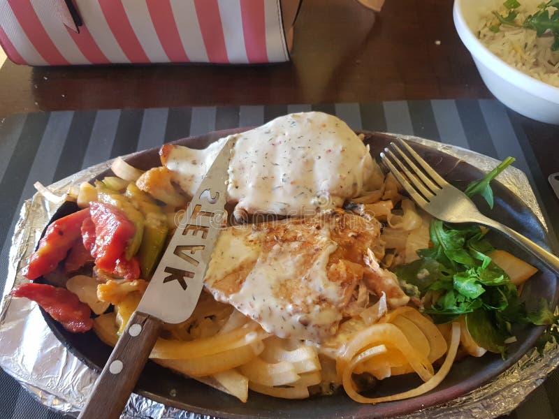 Chicken Steak with White Sauce in Sizzling Plate Stock Image - Image of ...