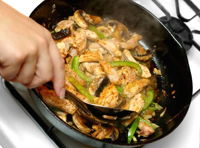 Chicken stir-fry cooking stock image. Image of preparation - 9330083
