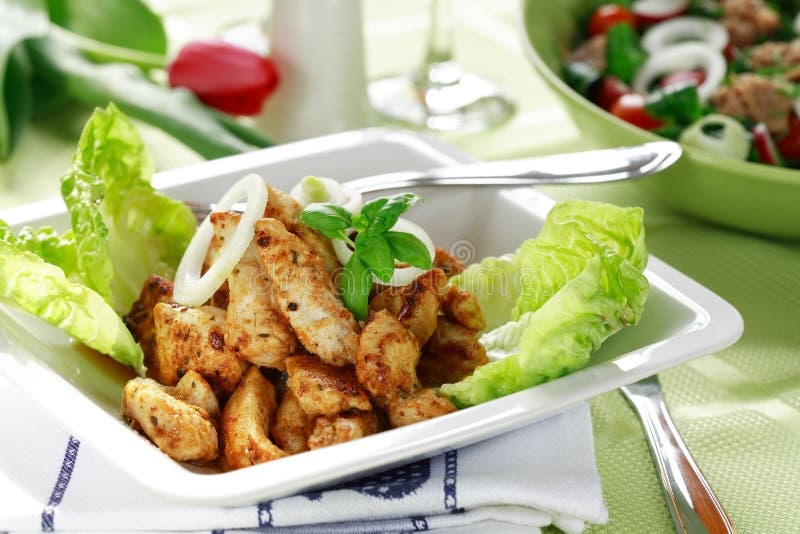 Chicken stripes with salad stock photo. Image of meat - 2039250