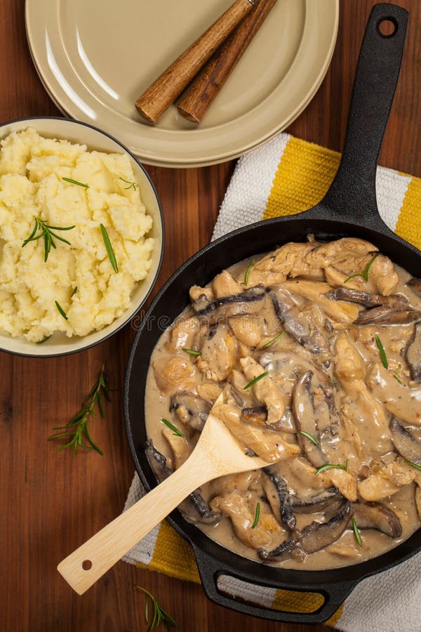 Chicken Stroganoff Accompanied with Rice, Salad and Potato Straw Stock ...