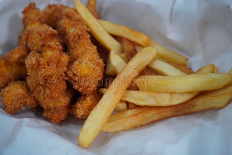Chicken tender on paper. stock photo. Image of lunch - 191362890