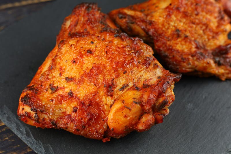 Chicken Thighs Baked with Vegetables and Spices. Grilled Chicken Meat ...