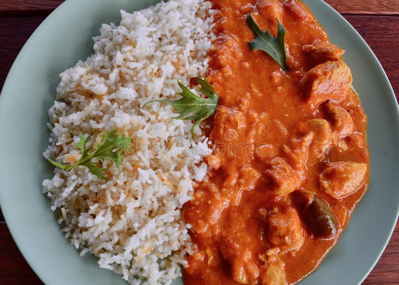 Chicken Tikka Masala Curry with Rice on the Table Stock Photo - Image ...