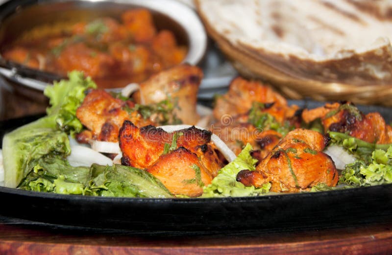Chicken Tikka stock image. Image of garnish, naan, bread - 30984025