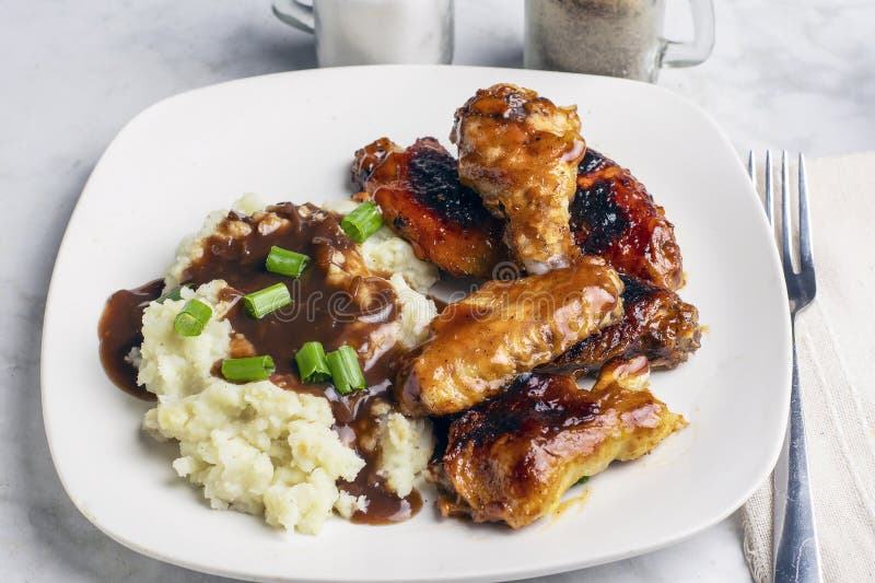 Chicken Wing in Barbecue Sauce Stock Photo - Image of wing, mashed ...