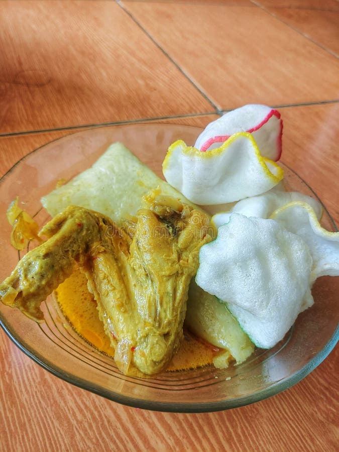 Chicken Wing Braised in Coconut Milk with Rice Cake and Some Crackers ...