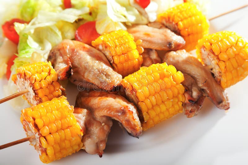 Chicken Wings with Corn Skewers Stock Image - Image of shot, single ...