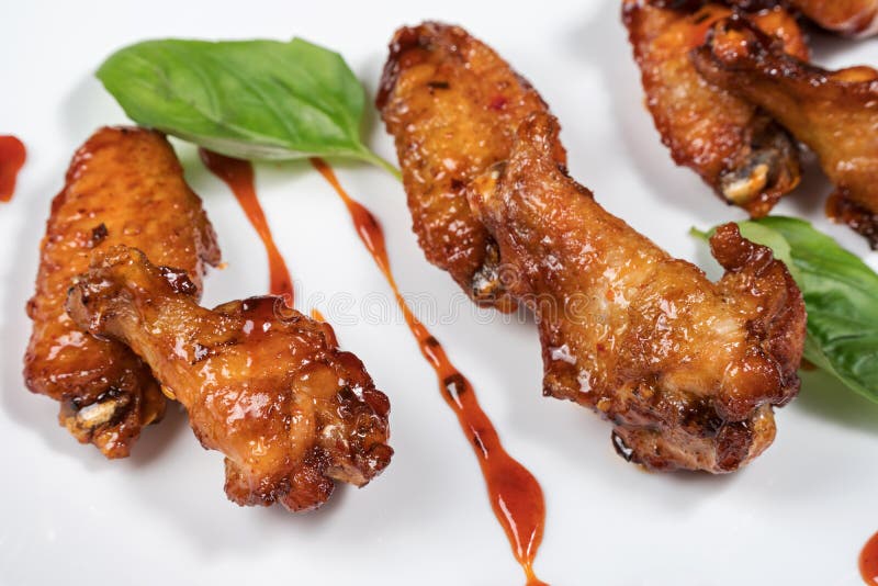 Chicken wings on a plate stock photo. Image of crispy - 78389456