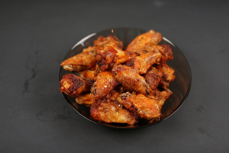 Chicken wings in a plate stock image. Image of plates - 59191197