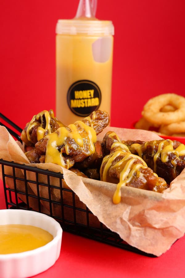 Chicken Wings Served with Sauce, Fast Food, Vertical Stock Image ...