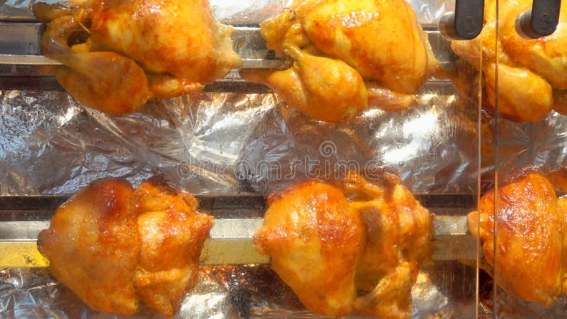 Fried Chickens Lying on the Grill Grid with Crispy Crust Filmed in ...